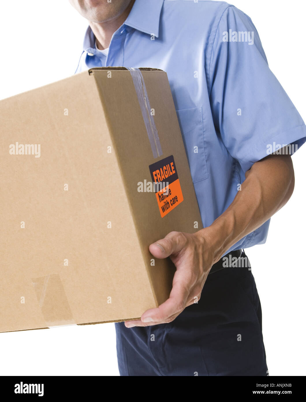 Mid section view of a delivery man carrying a box Stock Photo - Alamy