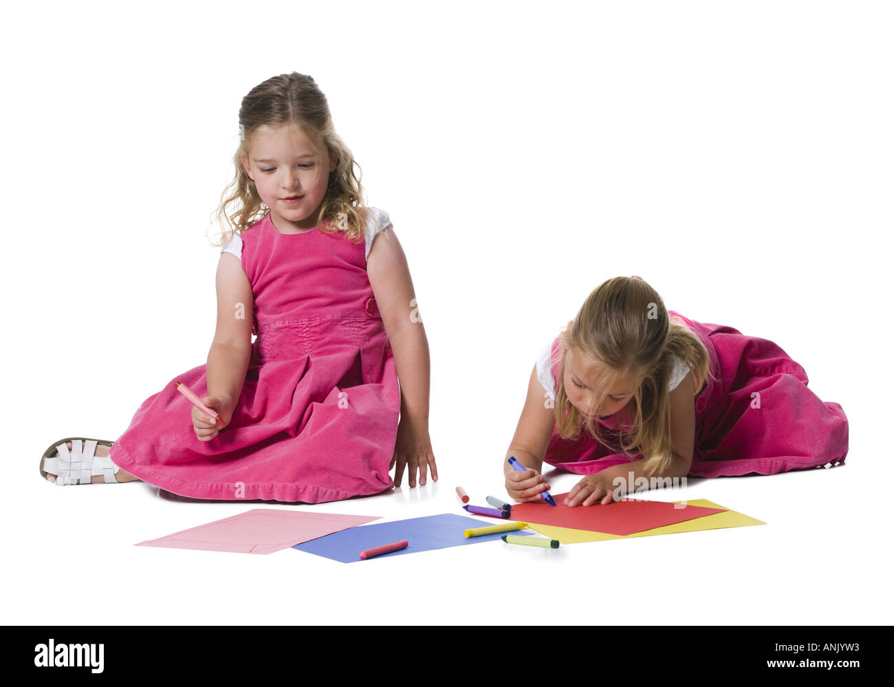 Two girls drawing Stock Photo - Alamy