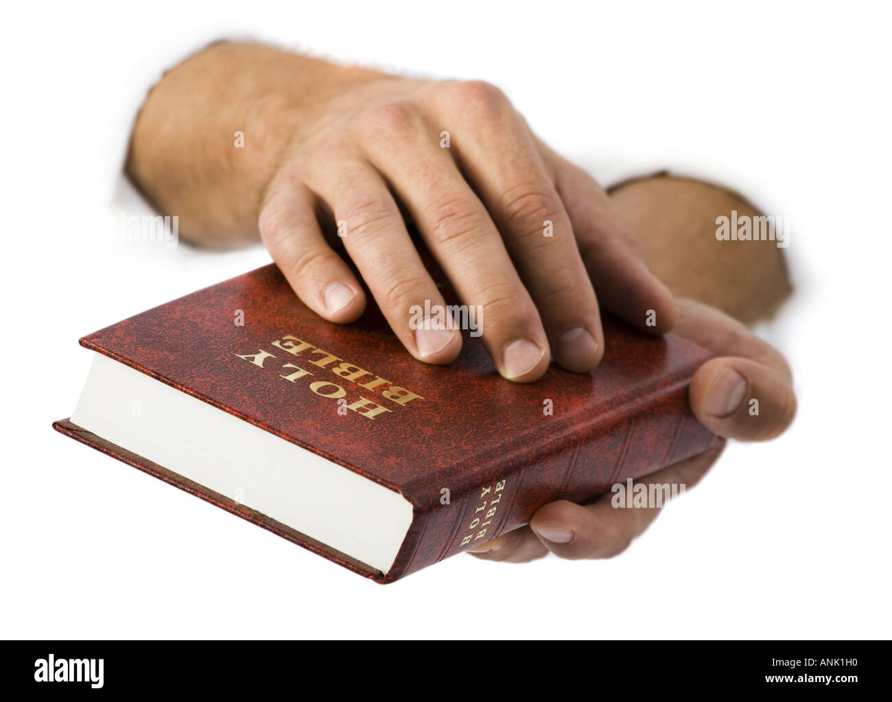 Hands holding bible Cut Out Stock Images & Pictures - Alamy
