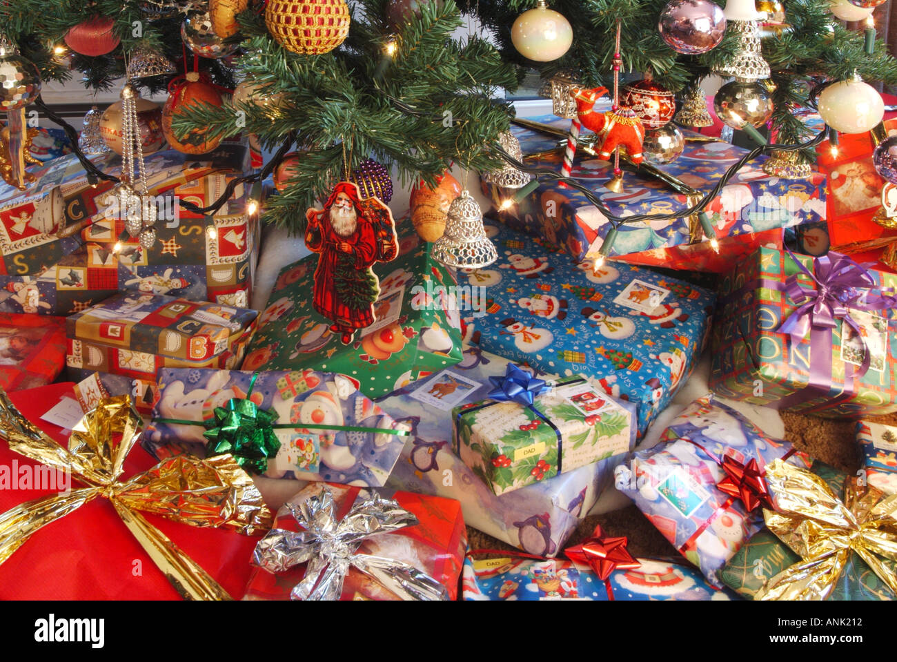 Lights wrapped around a tree hi-res stock photography and images - Alamy