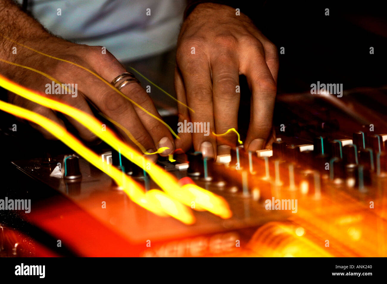 DJ at work in a club Stock Photo - Alamy
