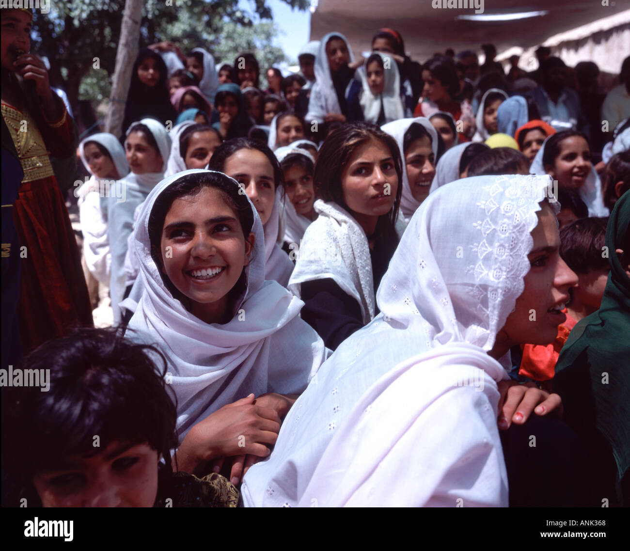 Afghan Female Student Smiles At School Event Stock Photo - Alamy
