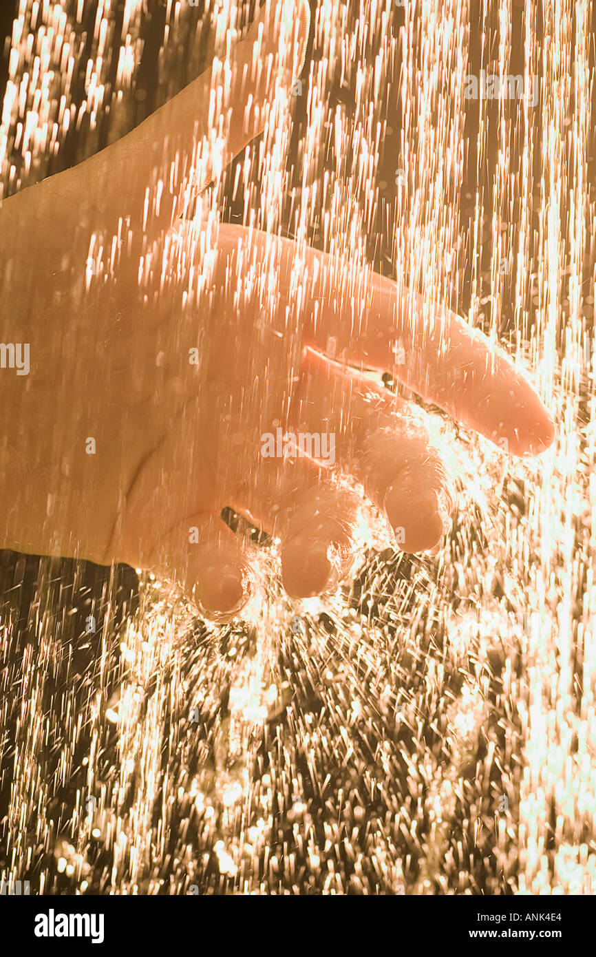 Water Running on Hand 2 Yellow Stock Photo - Alamy