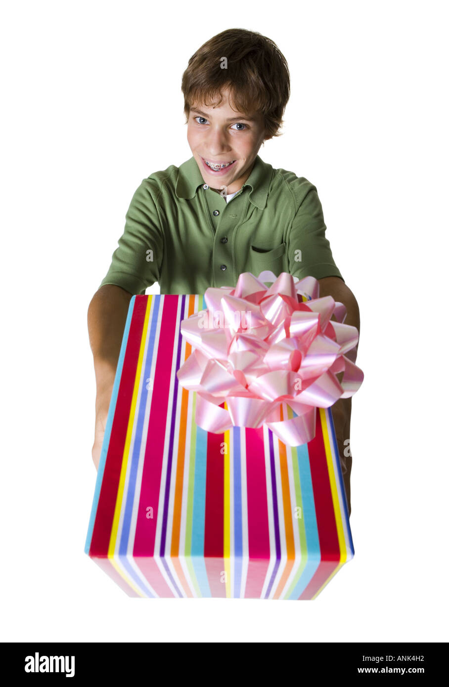 Teen boy holding gift box hi-res stock photography and images - Alamy