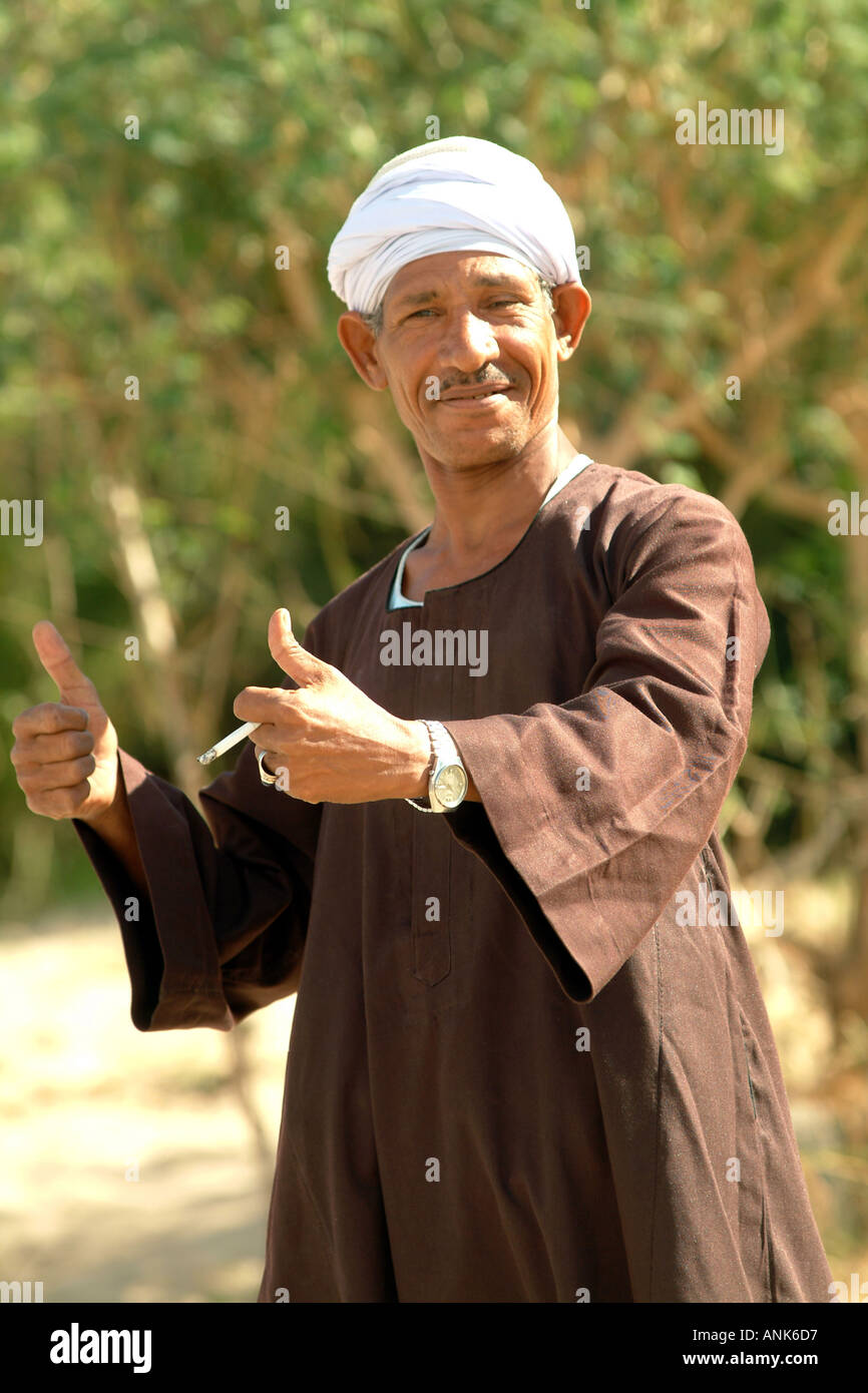 Egyptian man on the banks of the Nile river Egypt Stock Photo - Alamy