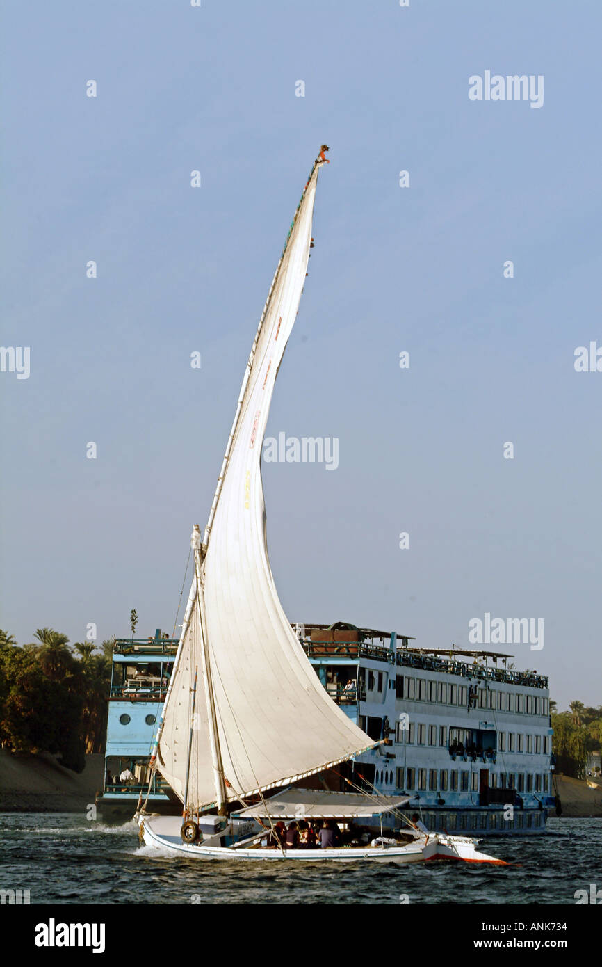 Felucca and cruise boat on the Nile river in Egypt Stock Photo - Alamy