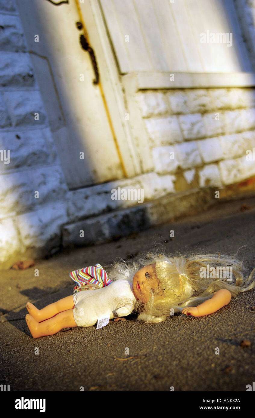 Doll lying on ground hi-res stock photography and images - Alamy