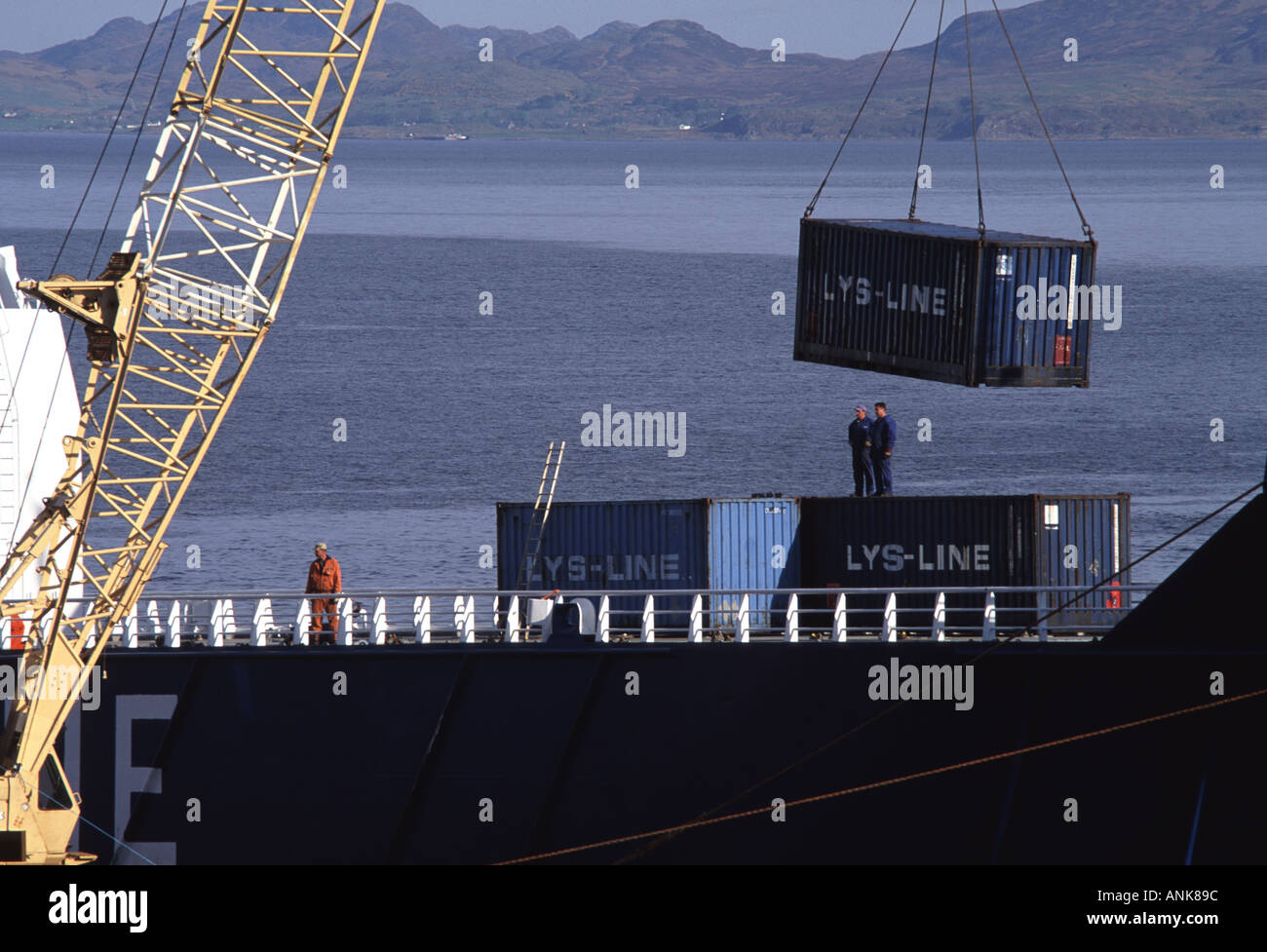 UK Scotland The Sound of Mull Container Ship aground on rocks removing ...