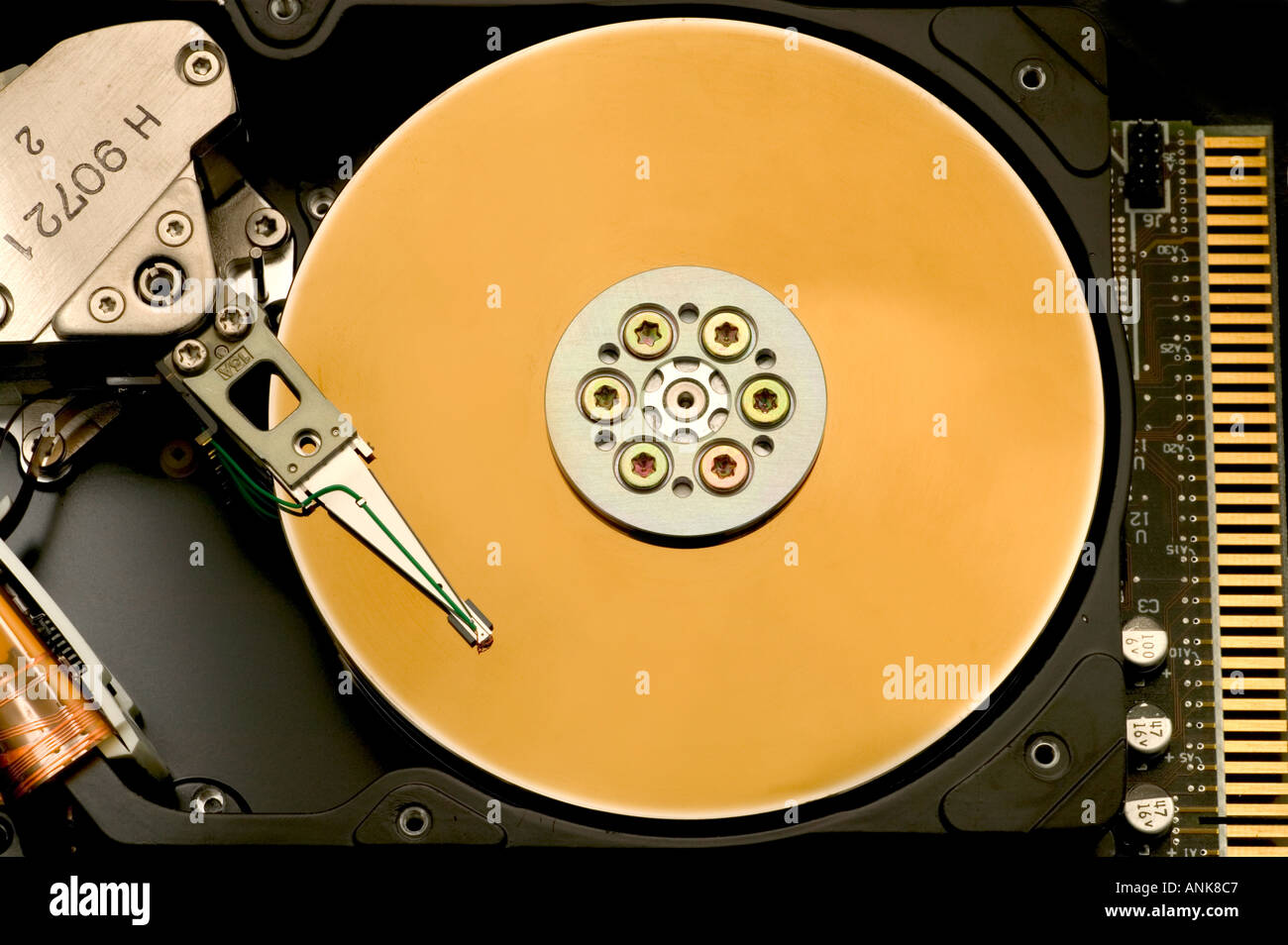 View inside a computer hardisk IDE hardrive Stock Photo - Alamy