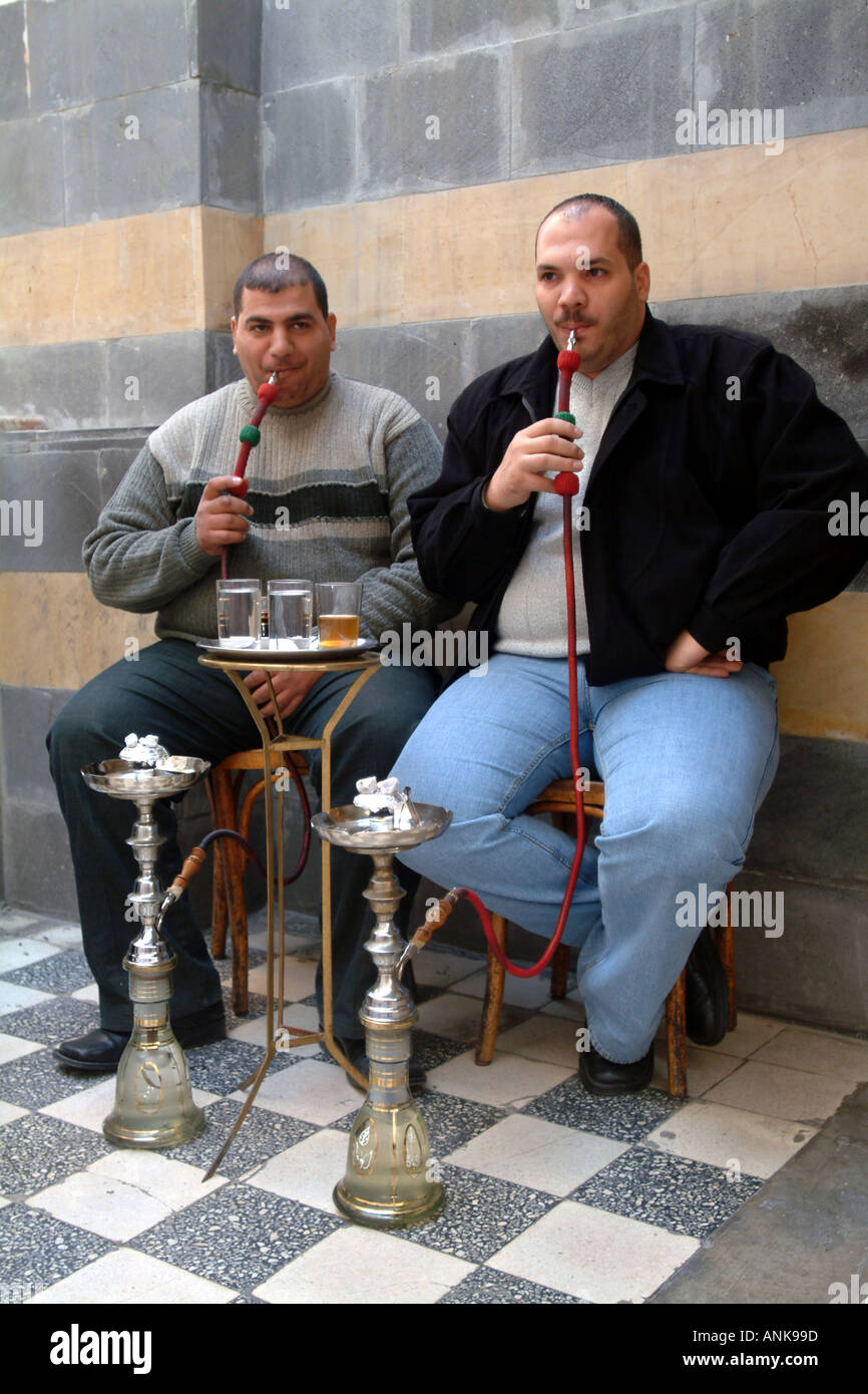Two men smoking sheesha pipes in Damascus Stock Photo - Alamy