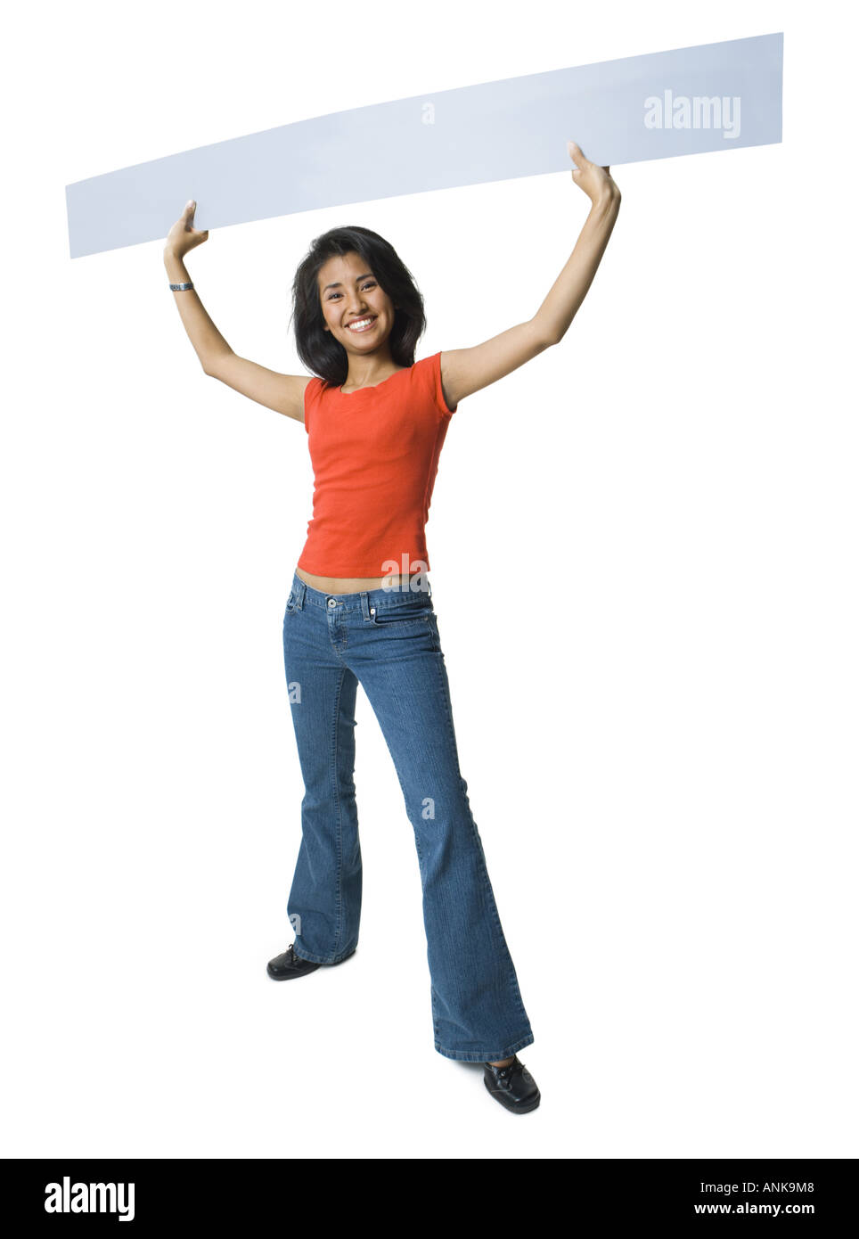 Portrait of a young woman holding up a blank sign Stock Photo - Alamy