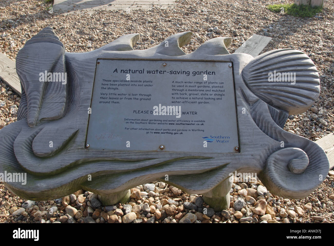tourist sign explaining new water efficient garden initiated by ...