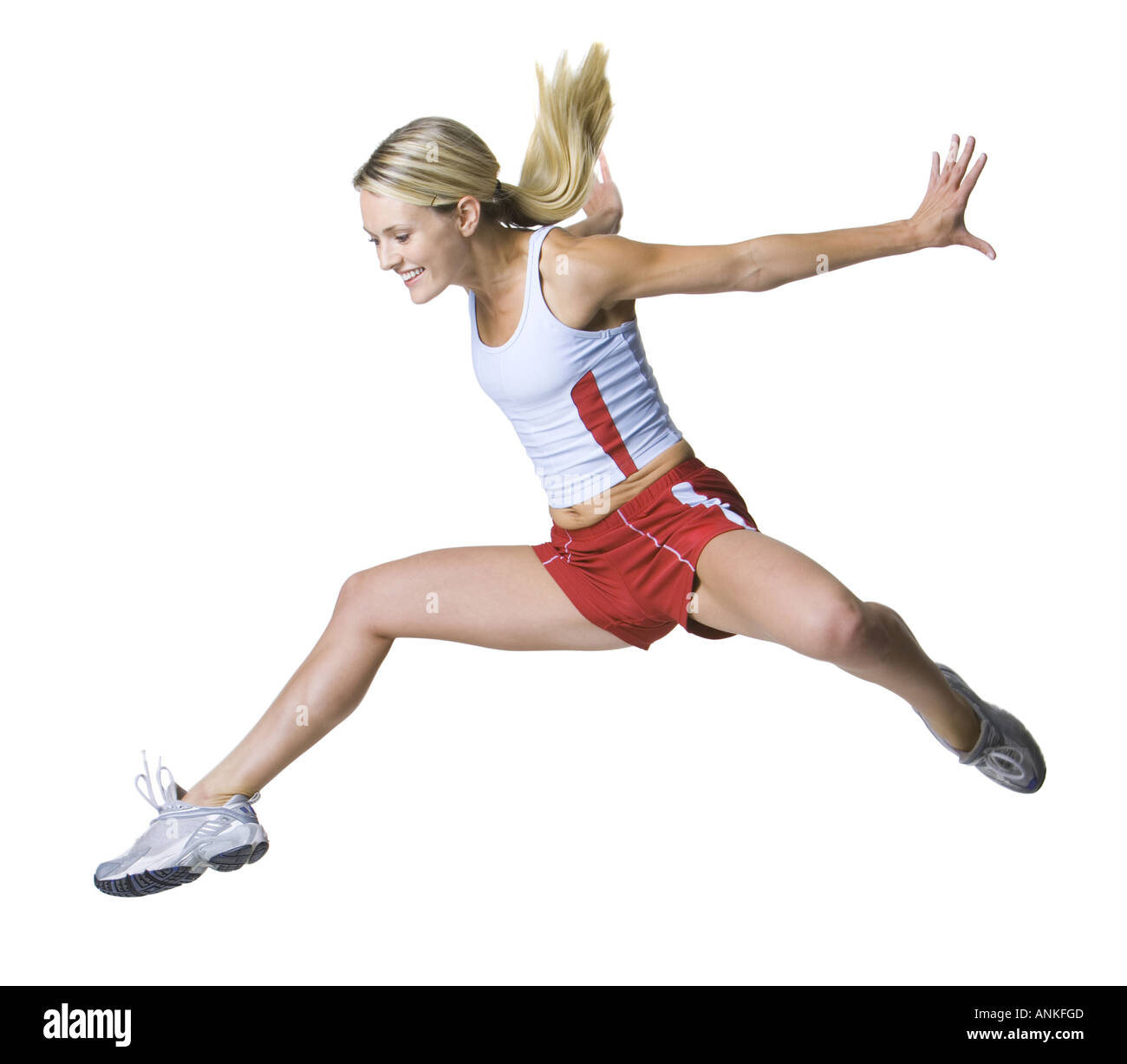 Young woman jumping Stock Photo - Alamy