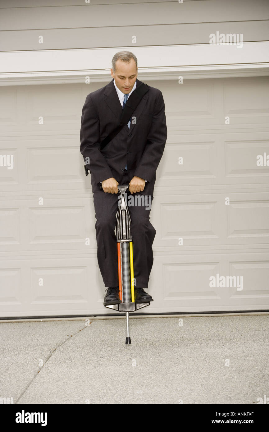 Pogo stick man hi-res stock photography and images - Alamy