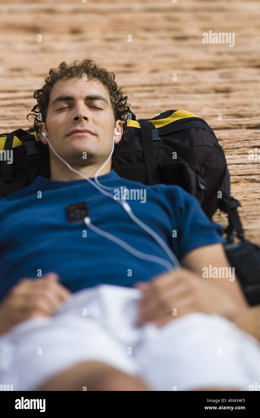 Close up of a young man lying on his back Stock Photo - Alamy
