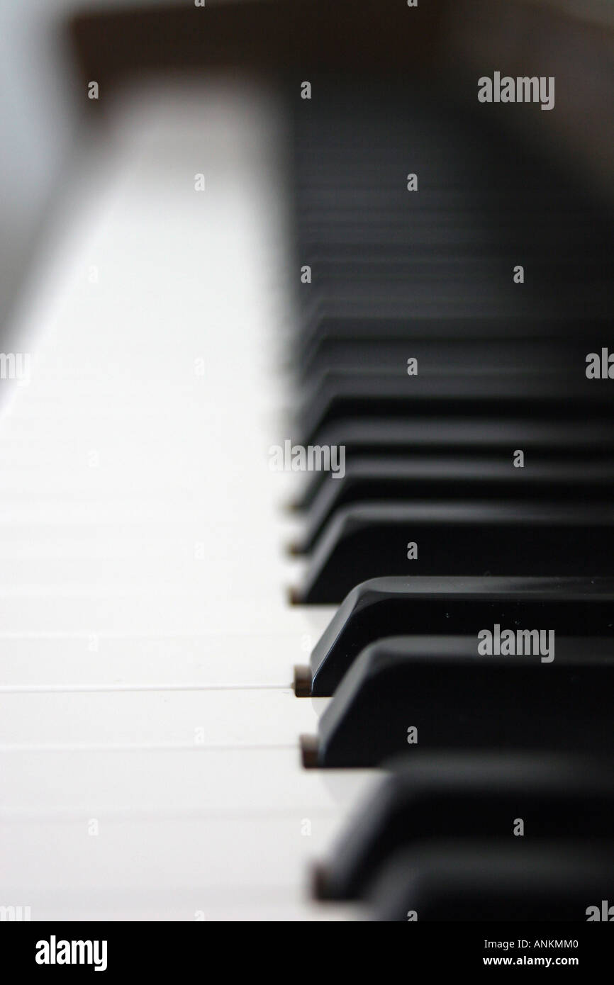 Piano keys fading into the distance Stock Photo - Alamy