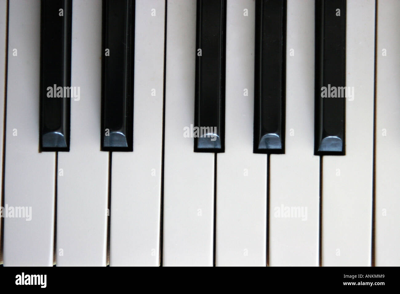 Piano keys seeing from above Stock Photo - Alamy