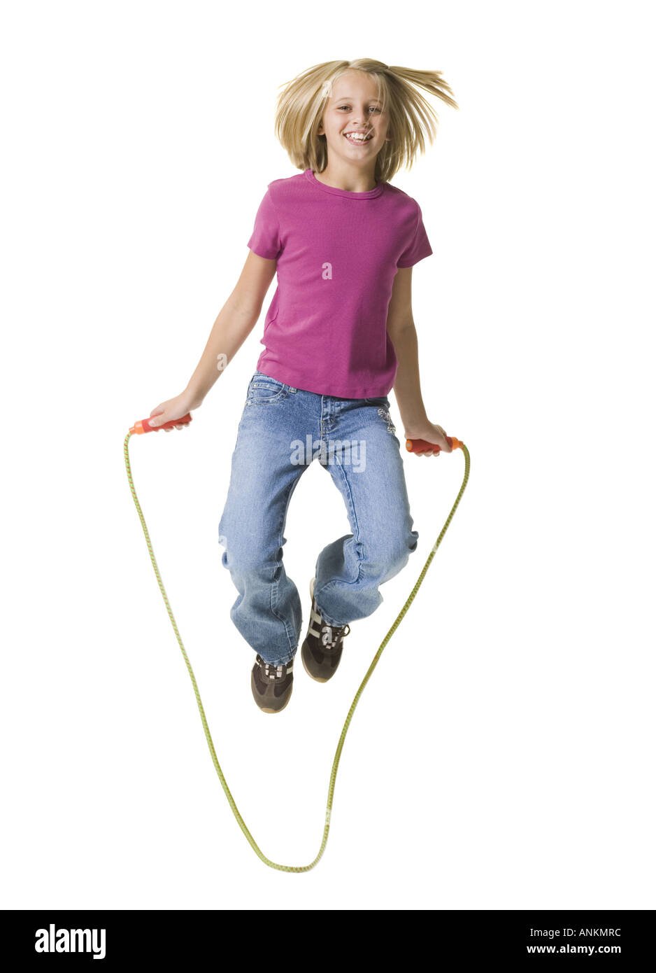 Young girl jumping rope Stock Photo - Alamy