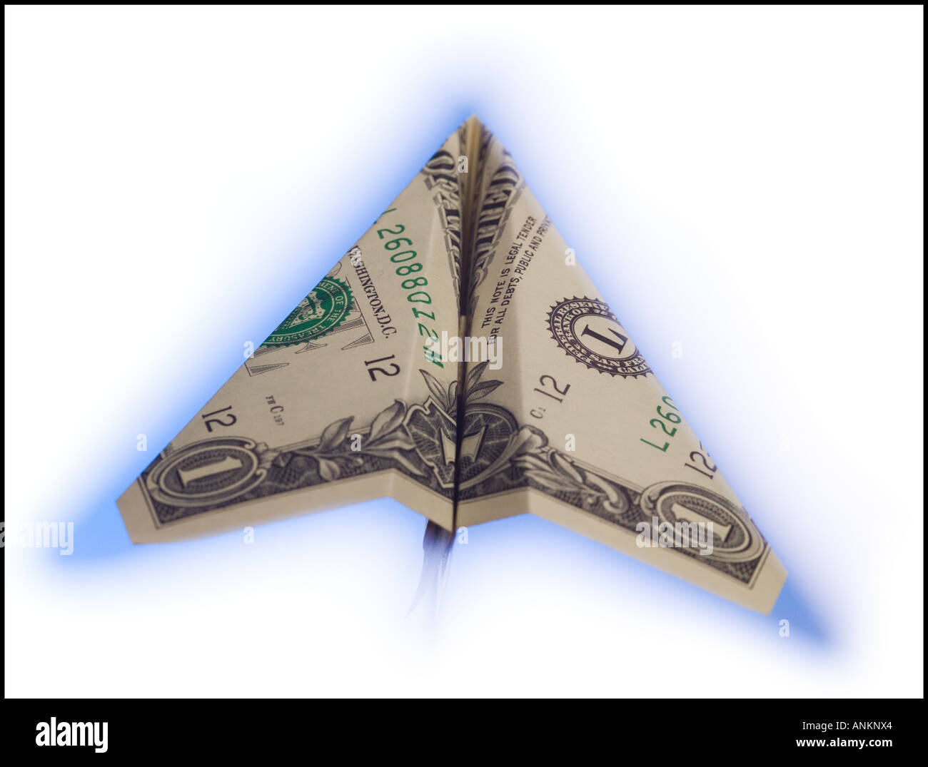 Close up of a paper airplane made from a US dollar bill flying Stock ...
