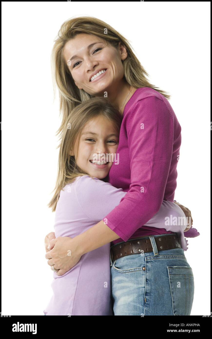 Portrait of a daughter hugging her mother Stock Photo - Alamy