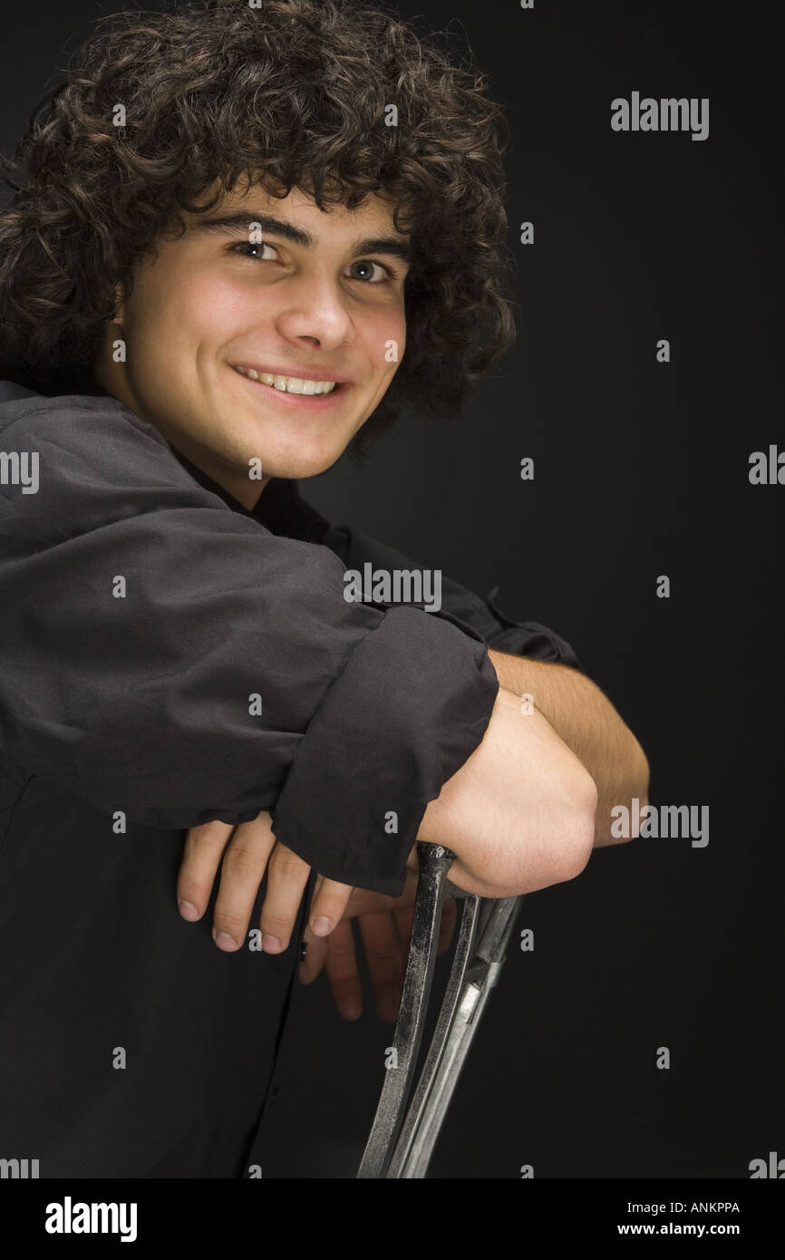 Side view of a teenage boy smiling Stock Photo - Alamy