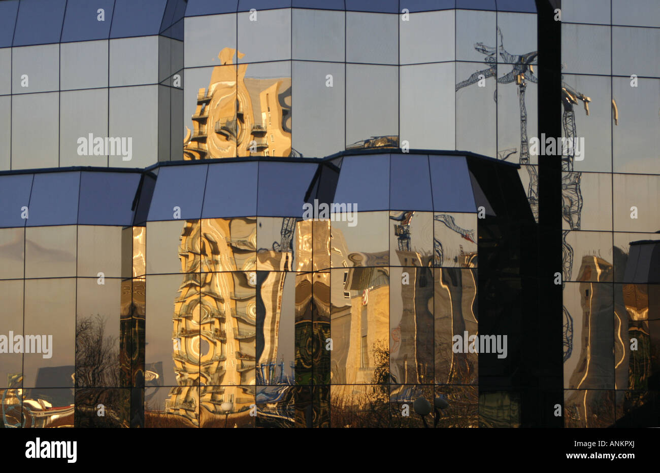 Reflections in glass building at Salford Quays, Manchester, UK Stock ...