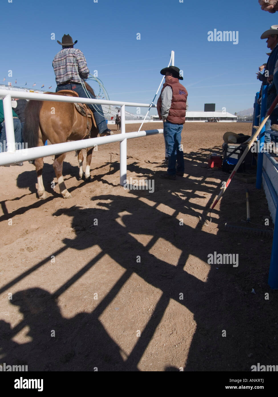 Cowboys sitting on fence hi-res stock photography and images - Alamy