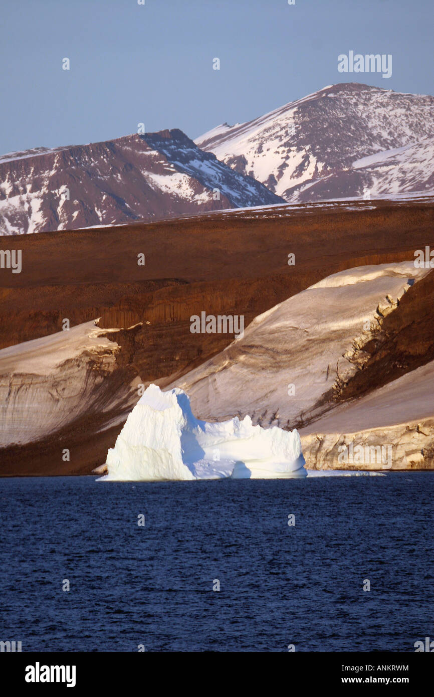 iceberg in front of mountains in greenland Stock Photo - Alamy