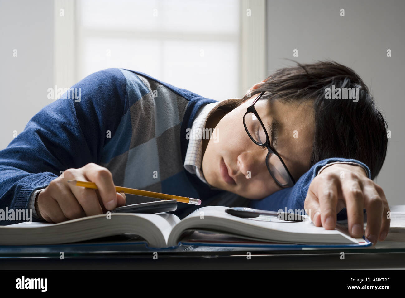 Man sleeping on open book hi-res stock photography and images - Alamy
