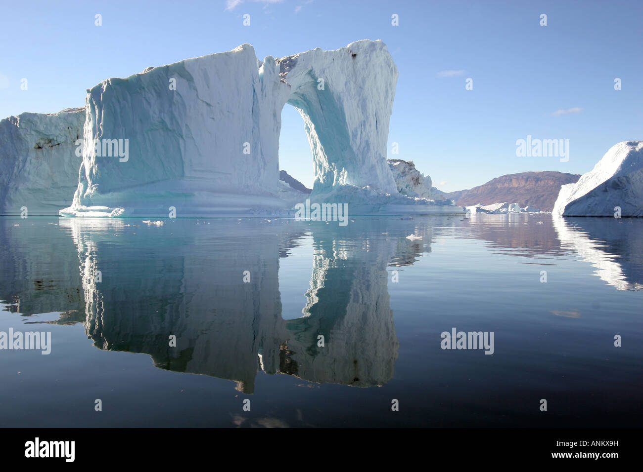 huge iceberg arch in greenland Stock Photo - Alamy