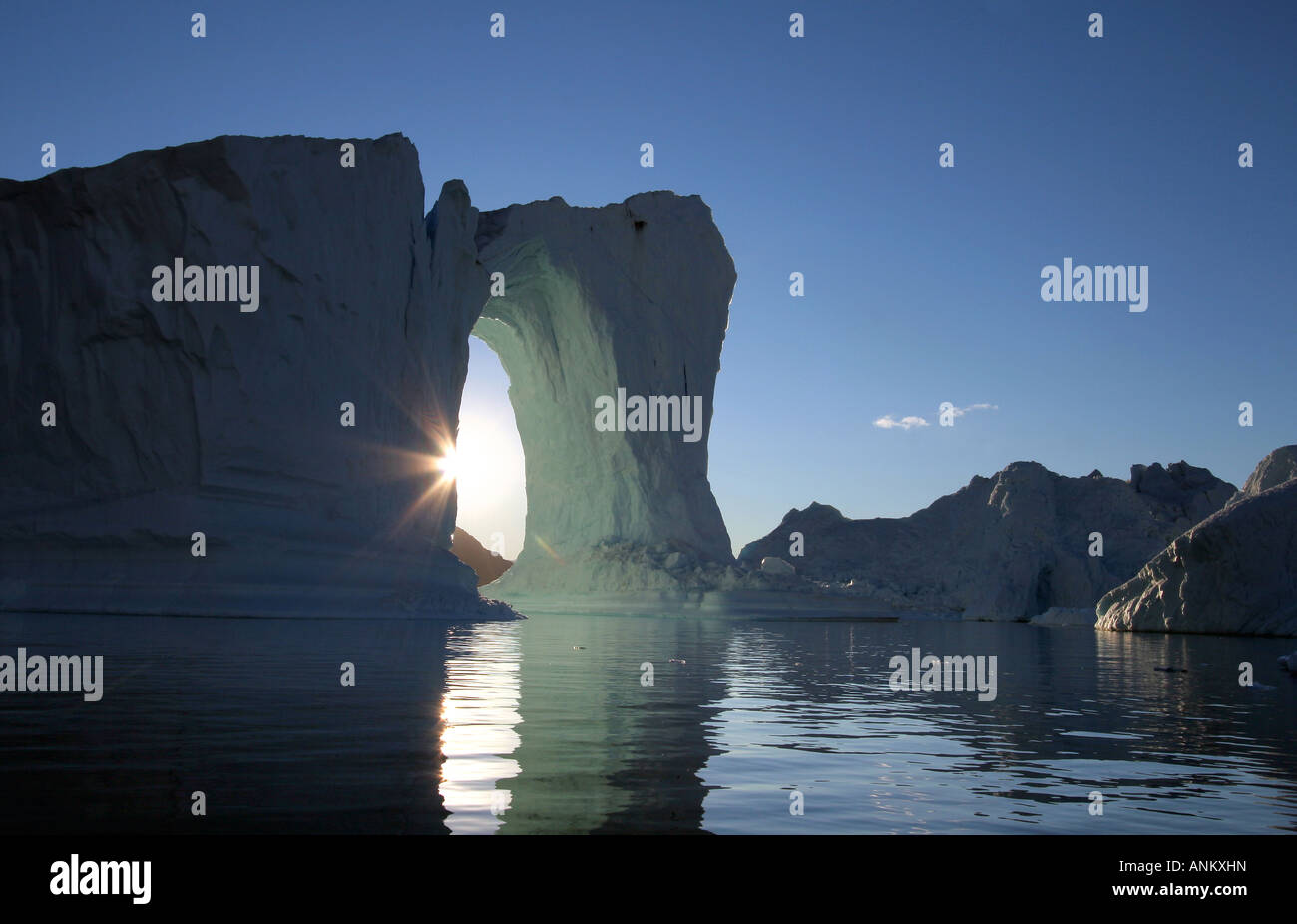 huge iceberg arch in greenland Stock Photo - Alamy