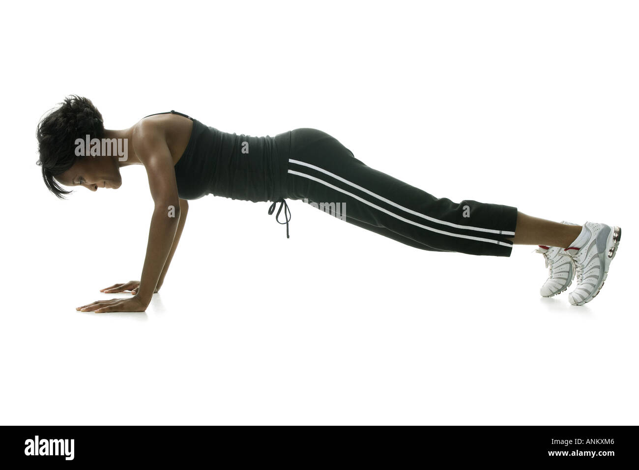 Fitness woman push ups Cut Out Stock Images & Pictures - Alamy