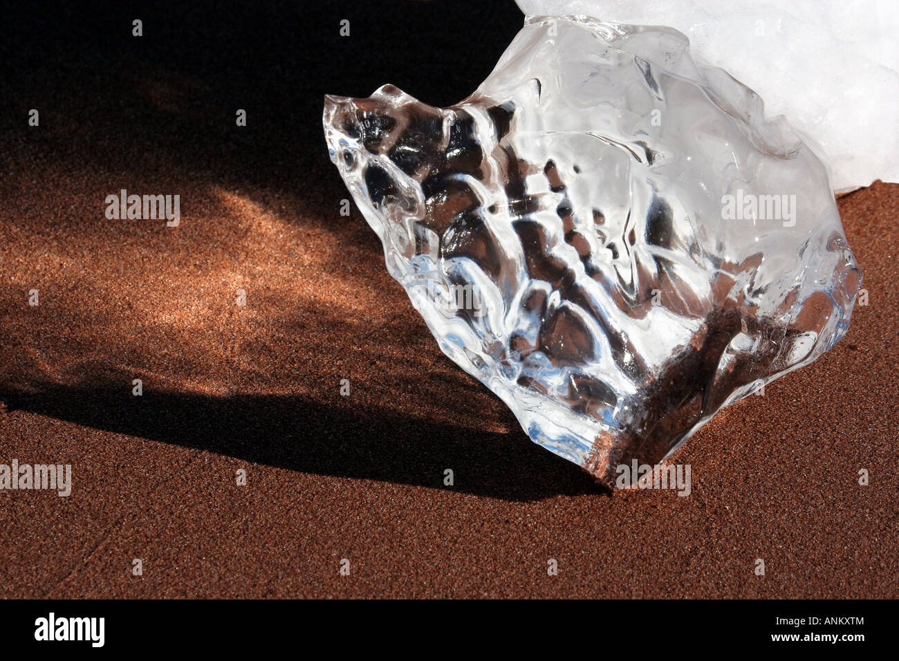 naturally sculpted piece of iceberg on beach in Greenland Stock Photo ...