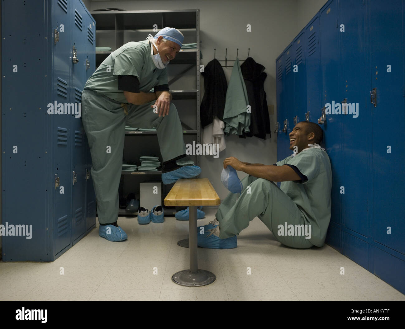Portrait of two male doctors talking to each other Stock Photo - Alamy