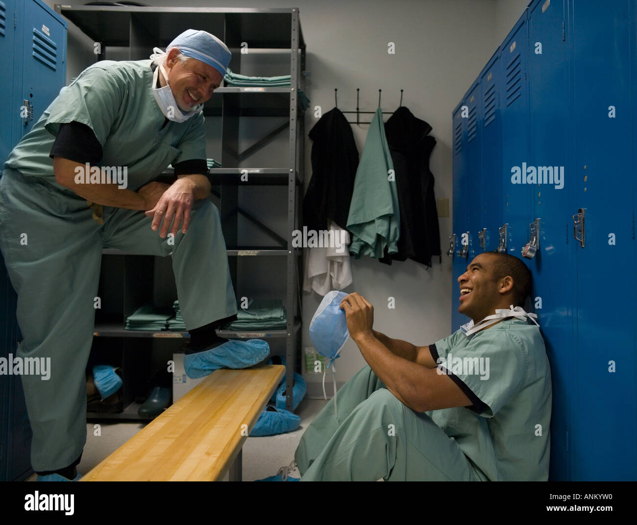 Portrait of two male doctors talking to each other Stock Photo - Alamy