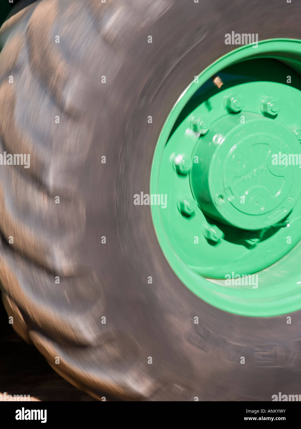 Wheel turning on tractor Stock Photo - Alamy