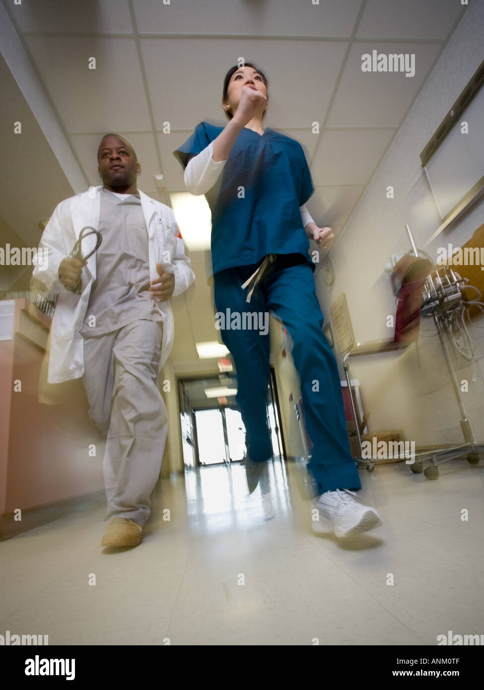 Doctor nurse running in corridor hi-res stock photography and images ...