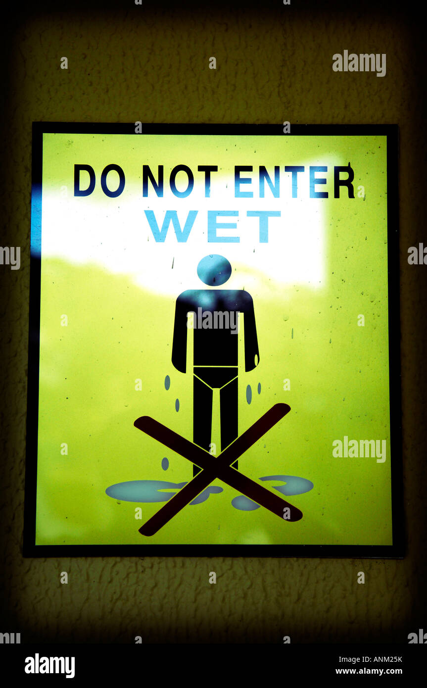 sign do not enter when wet imperative command Stock Photo - Alamy