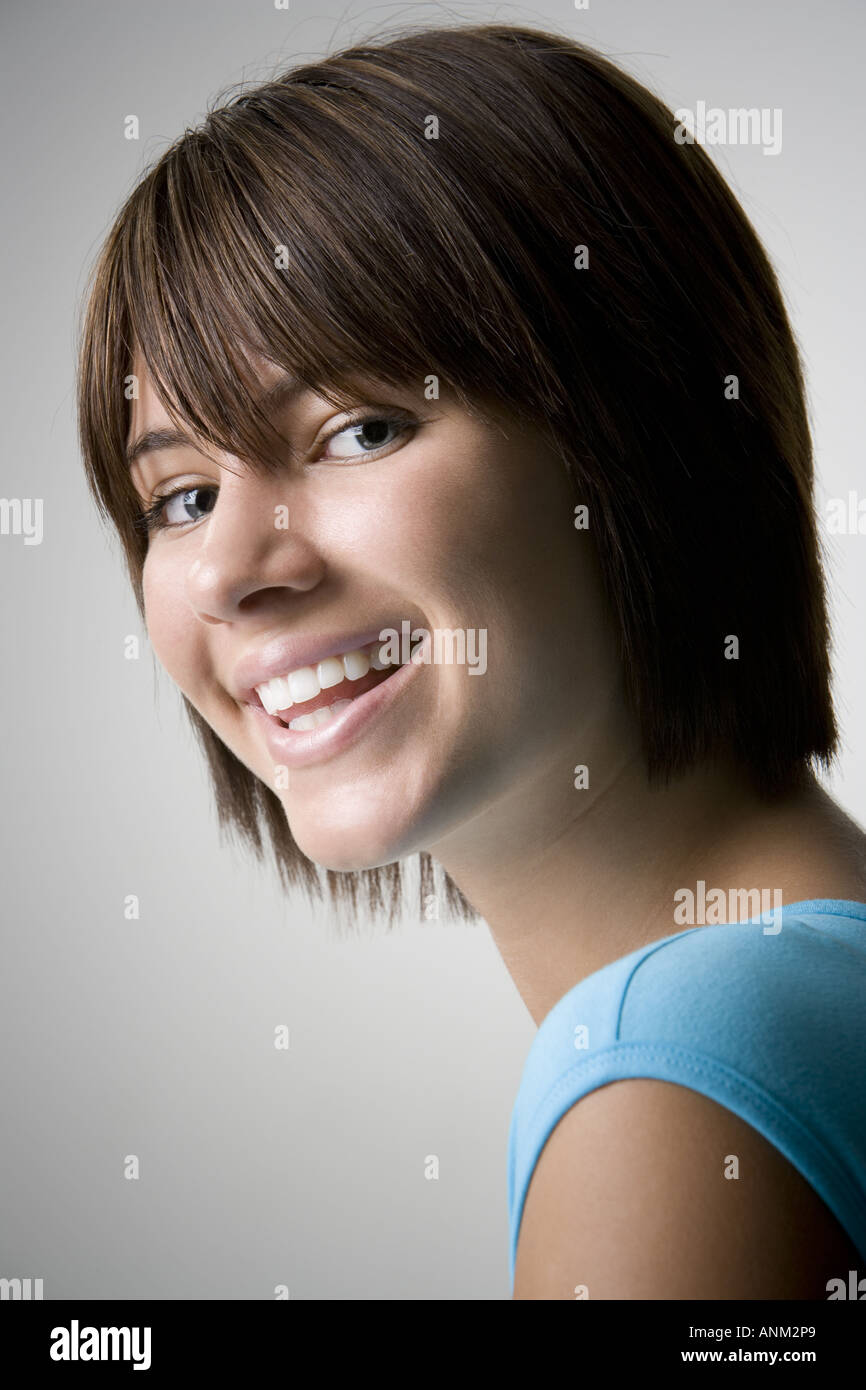 Portrait of a teenage girl smiling Stock Photo - Alamy