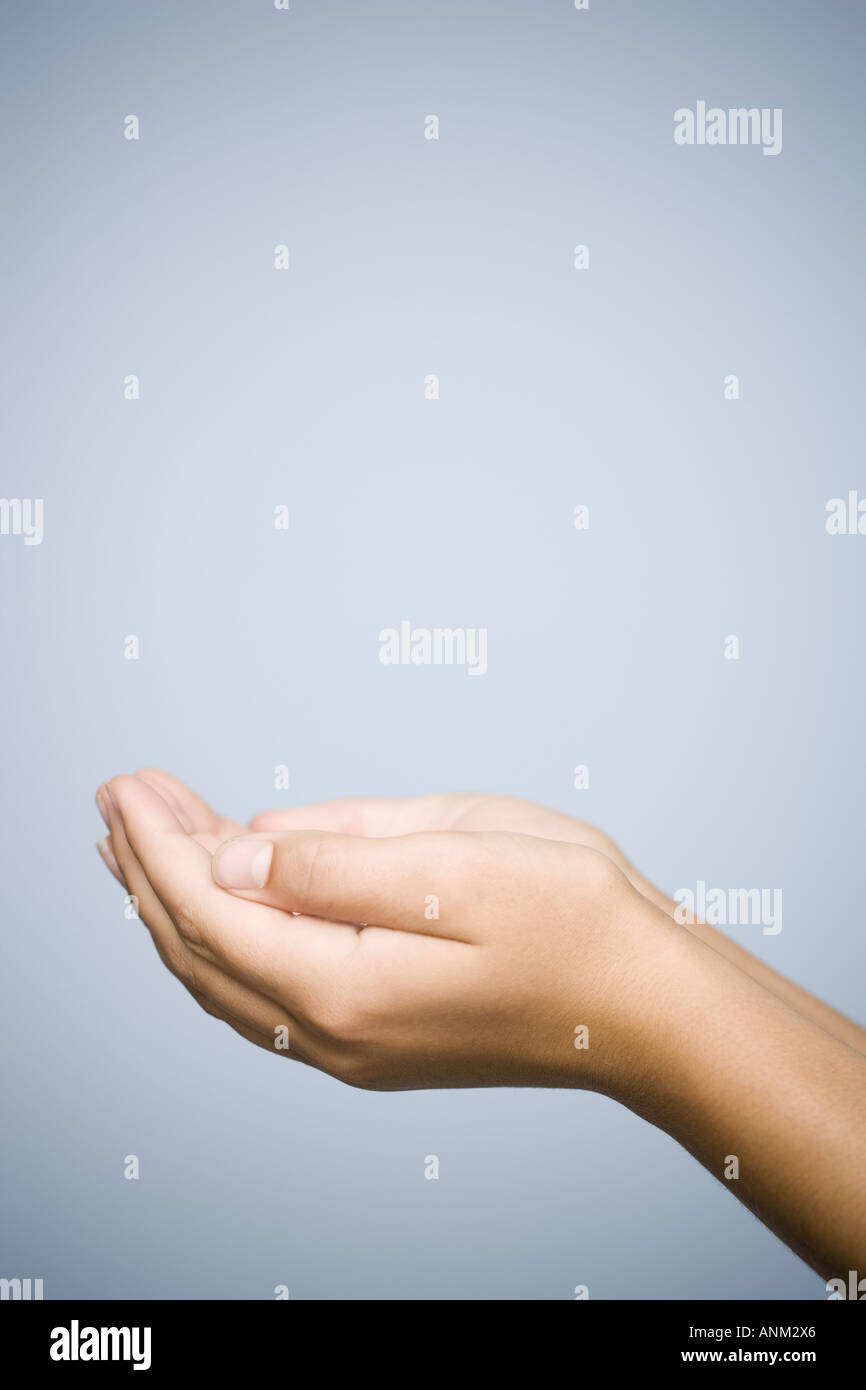 Close up of a person s hands cupped Stock Photo - Alamy