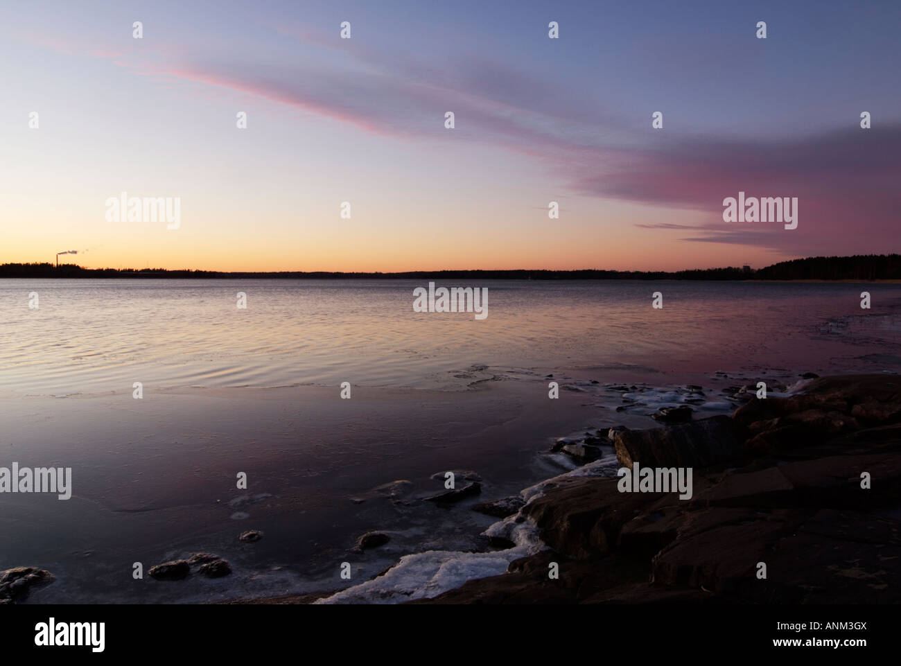 Colorful winter sunset by the freezing Baltic sea, Helsinki, Finland ...