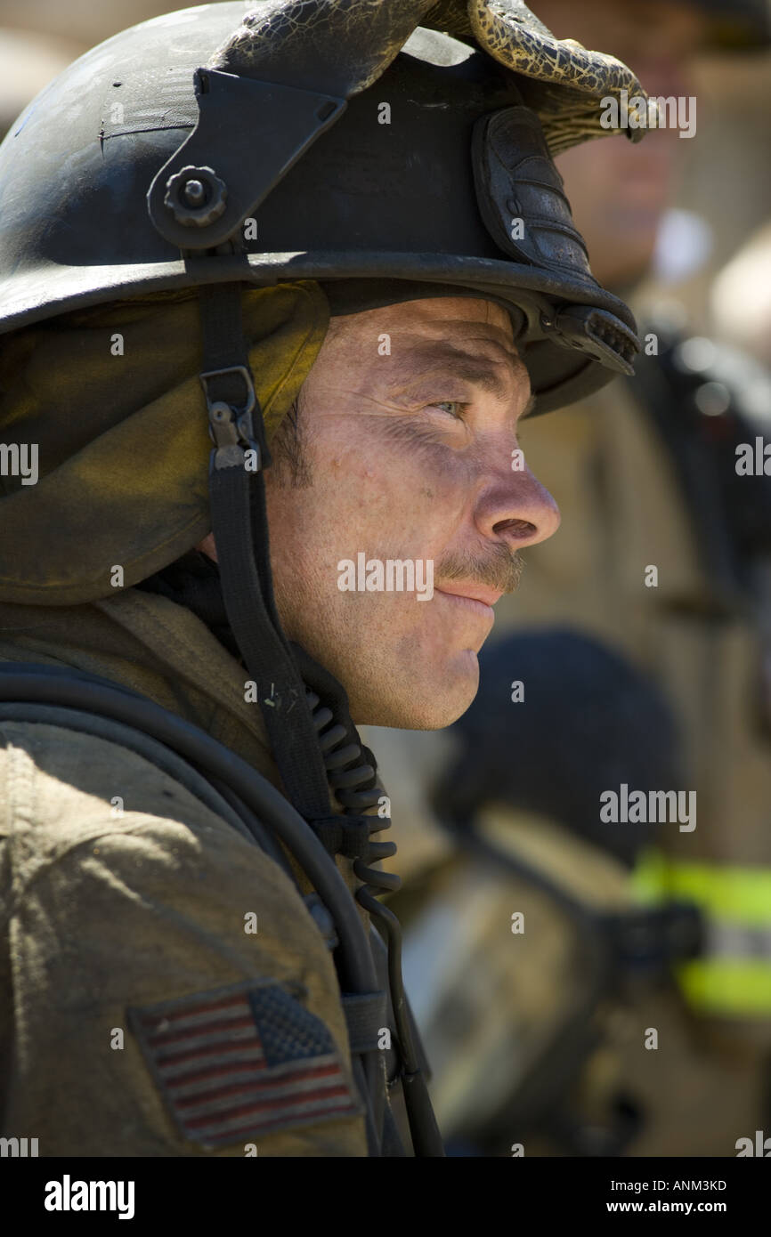 Side profile of a firefighter hi-res stock photography and images - Alamy