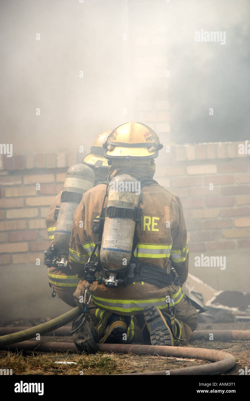 Fireman kneeling hi-res stock photography and images - Alamy