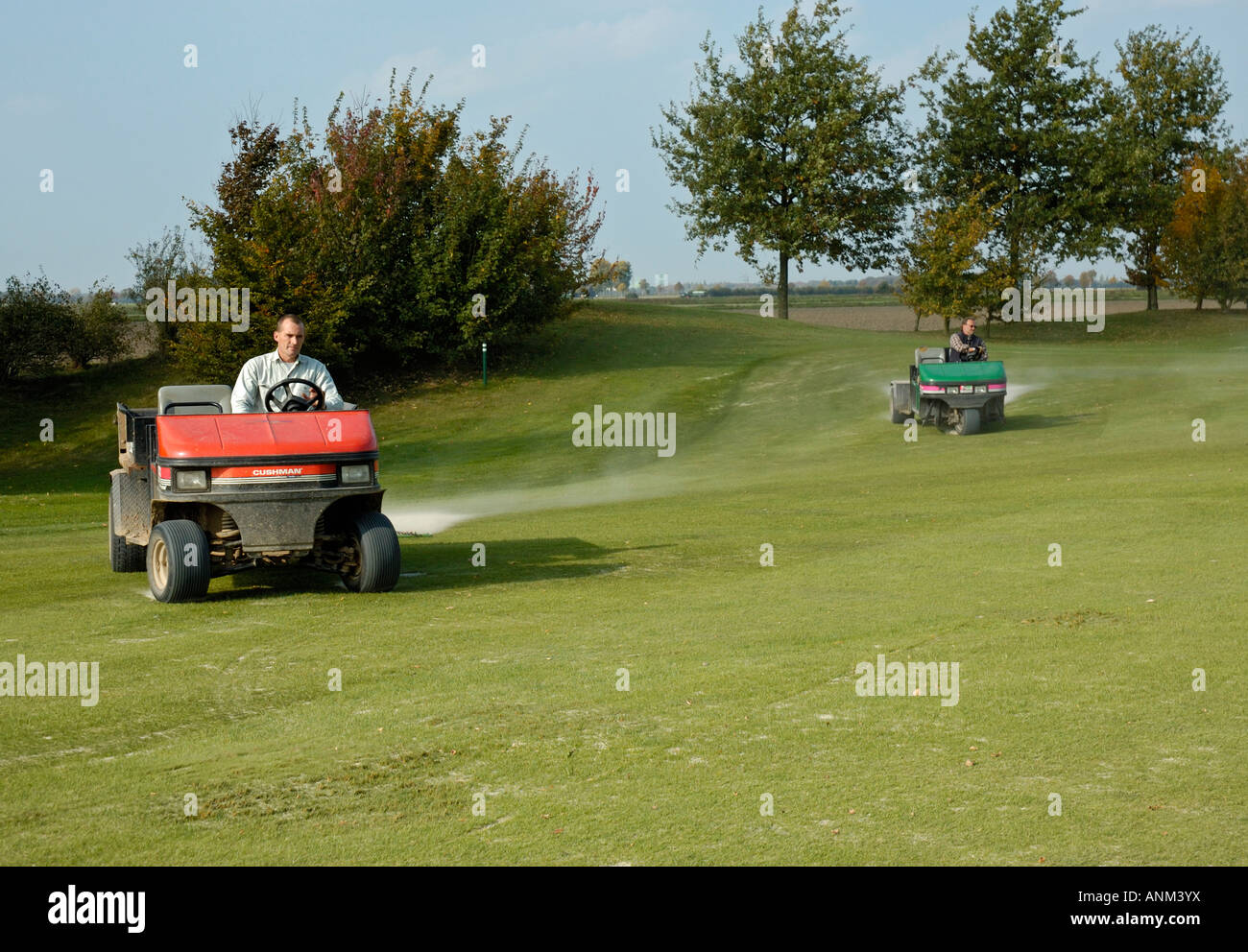Golf course maintenance, sanding the Fairway Stock Photo - Alamy
