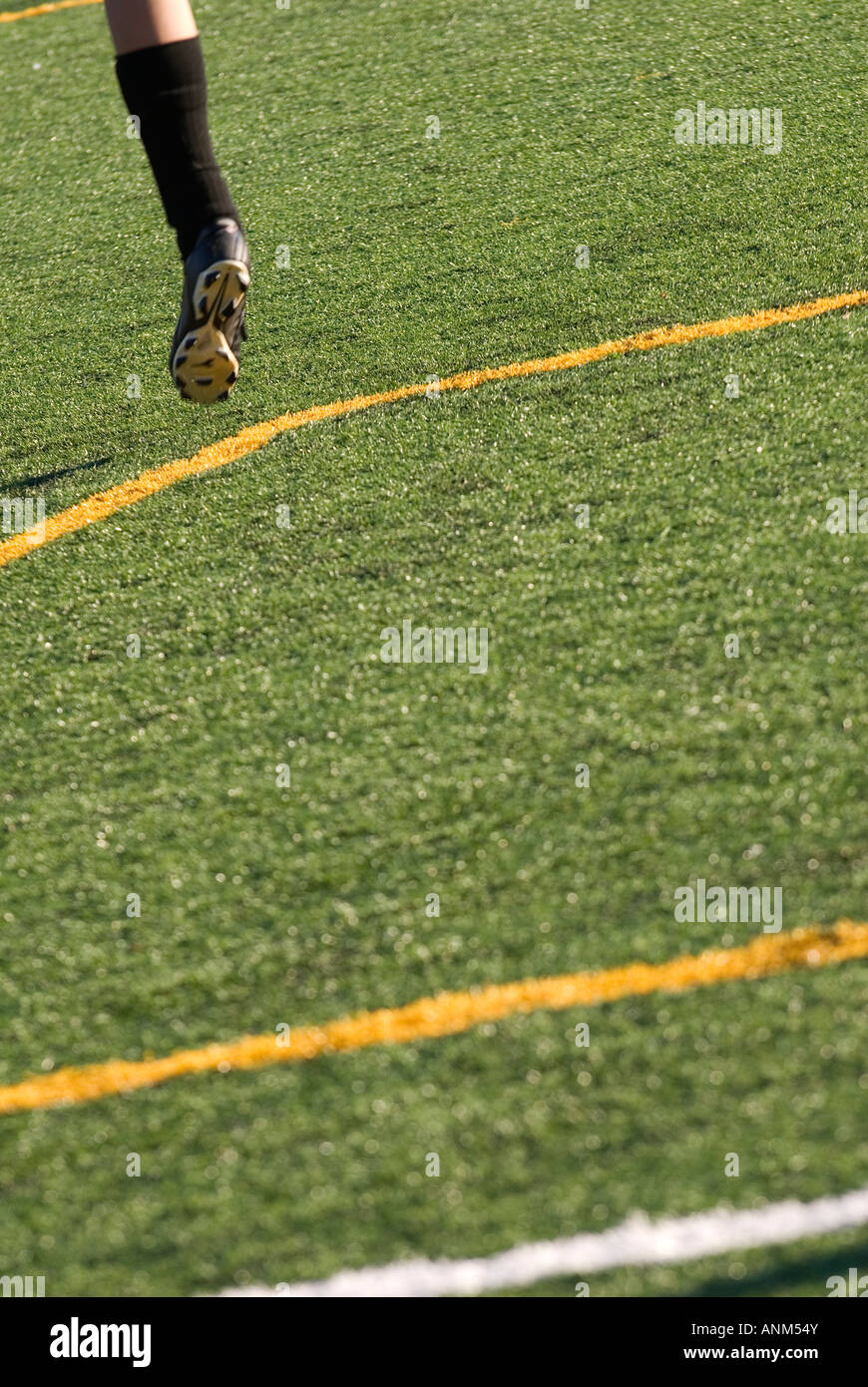 young girls playing soccer outdoors in grass field Stock Photo - Alamy