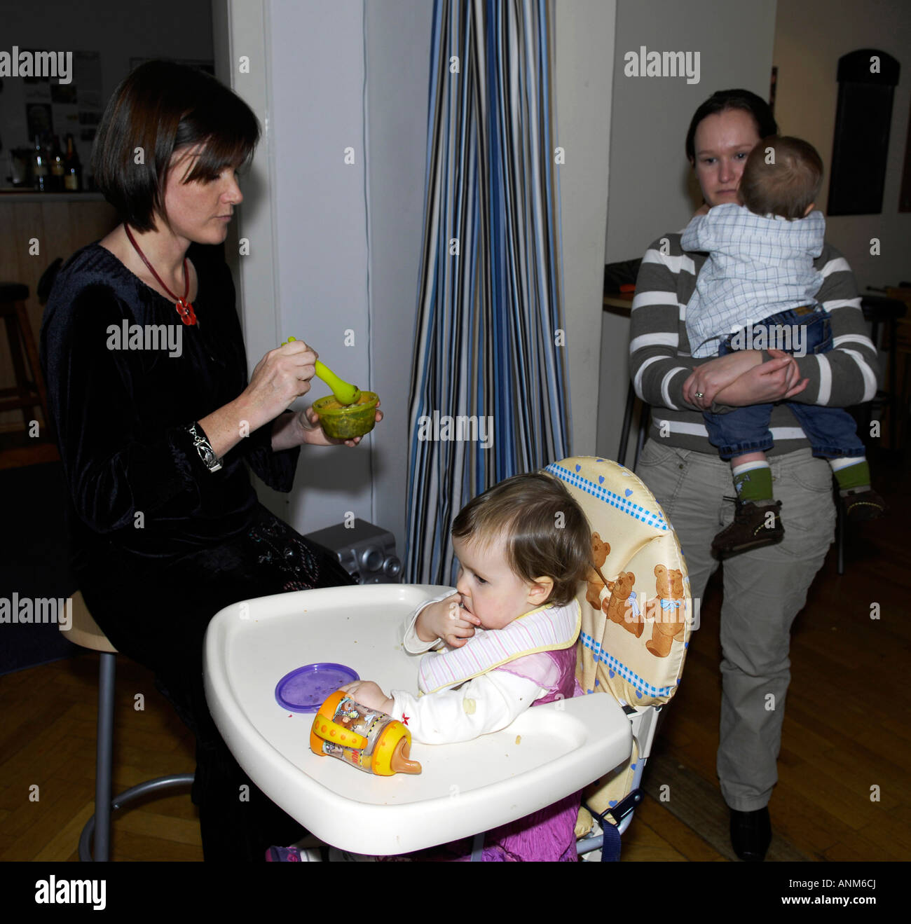 two women two babies motherhood Stock Photo - Alamy