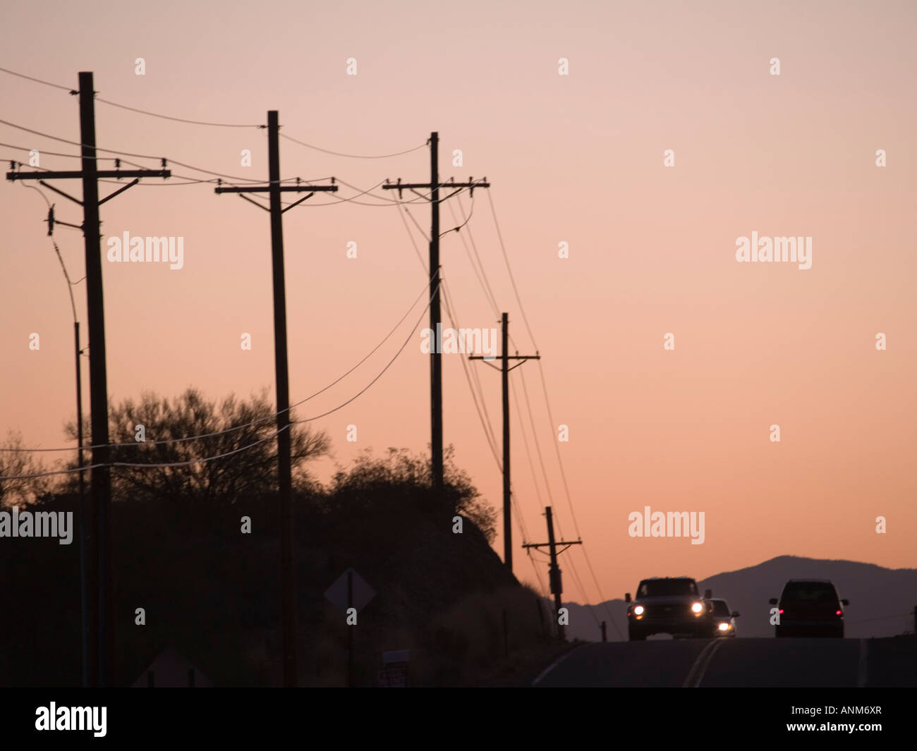 Street lights power lines at dawn Stock Photo - Alamy
