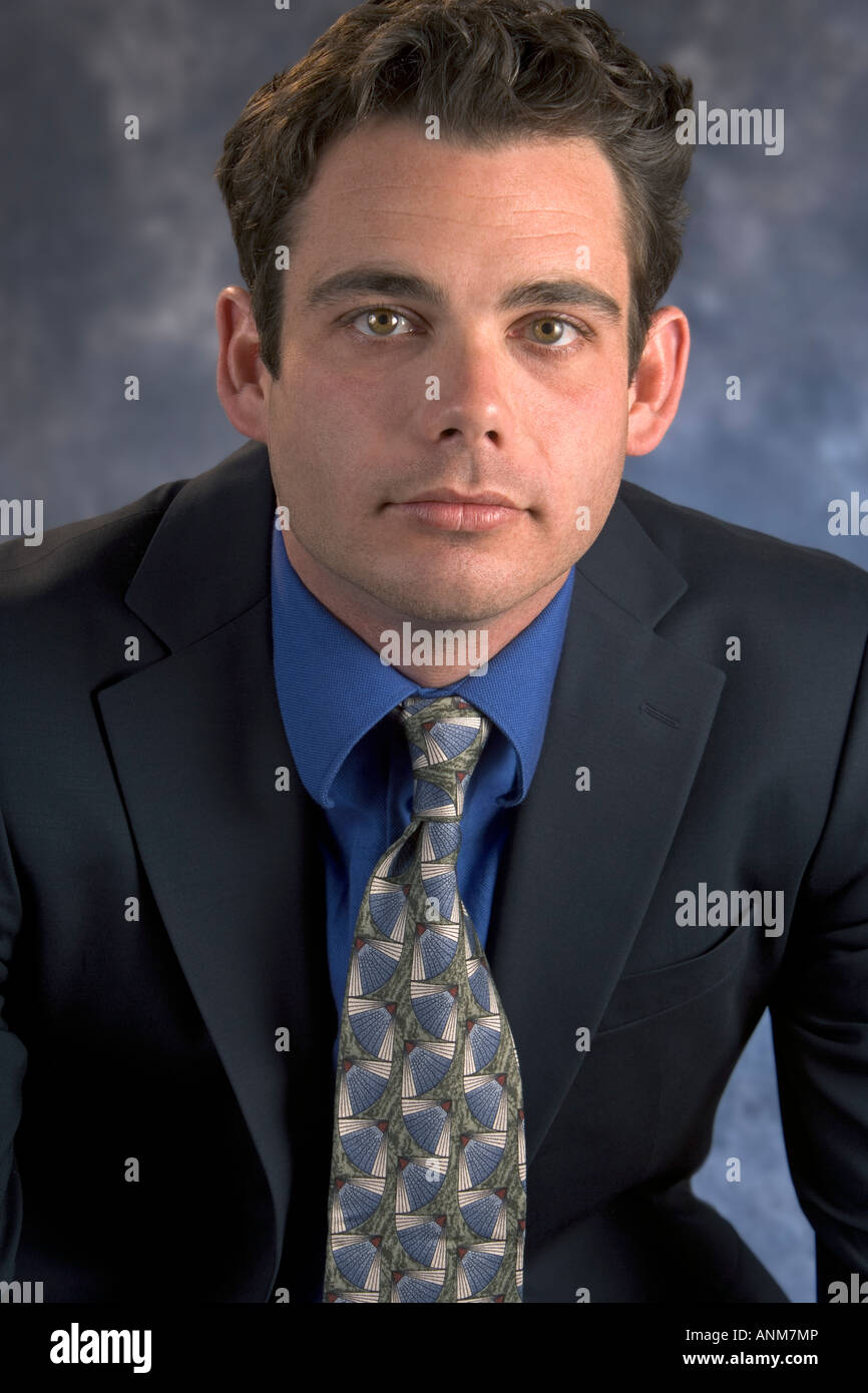 A young executive dressed for success in his suit Stock Photo - Alamy