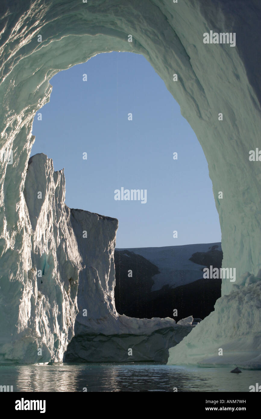 huge iceberg arch in greenland Stock Photo - Alamy