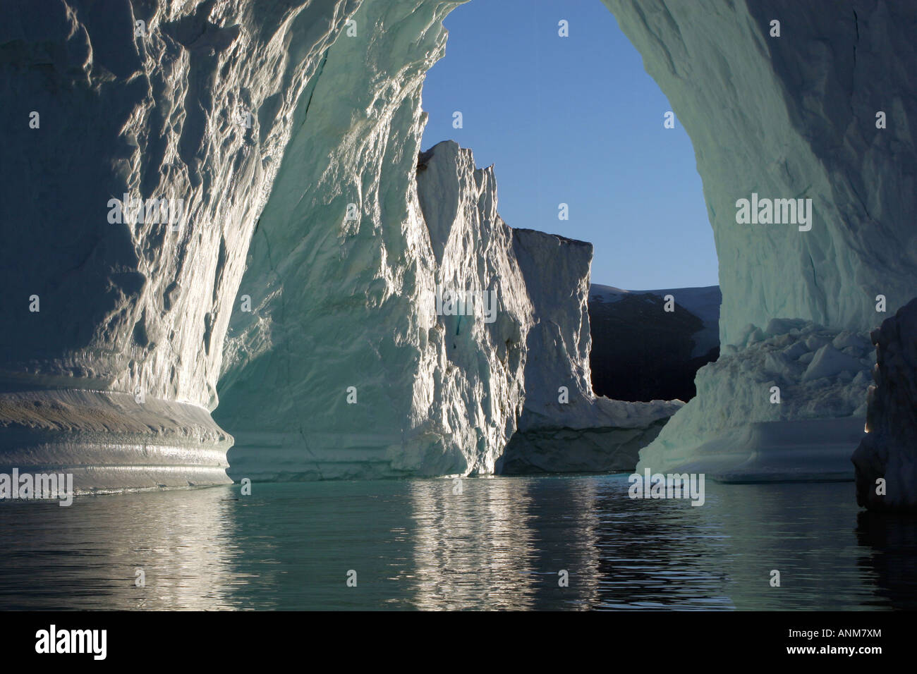 huge iceberg arch Stock Photo - Alamy